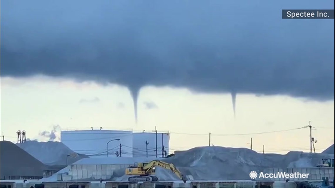 Multiple waterspouts start to spiral down | king5.com