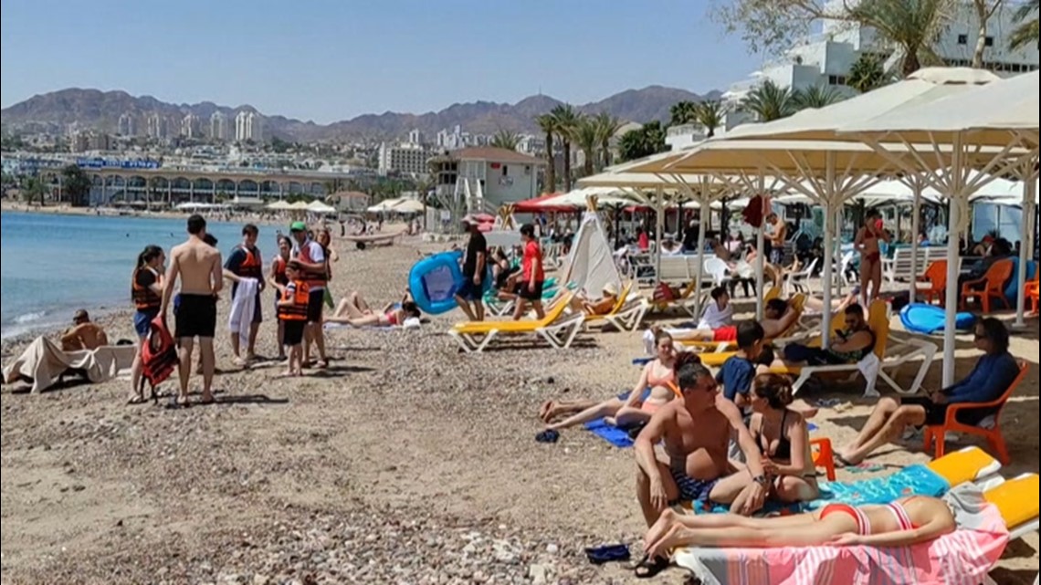 Israel beaches packed as country reaches 60% vaccination rate | king5.com