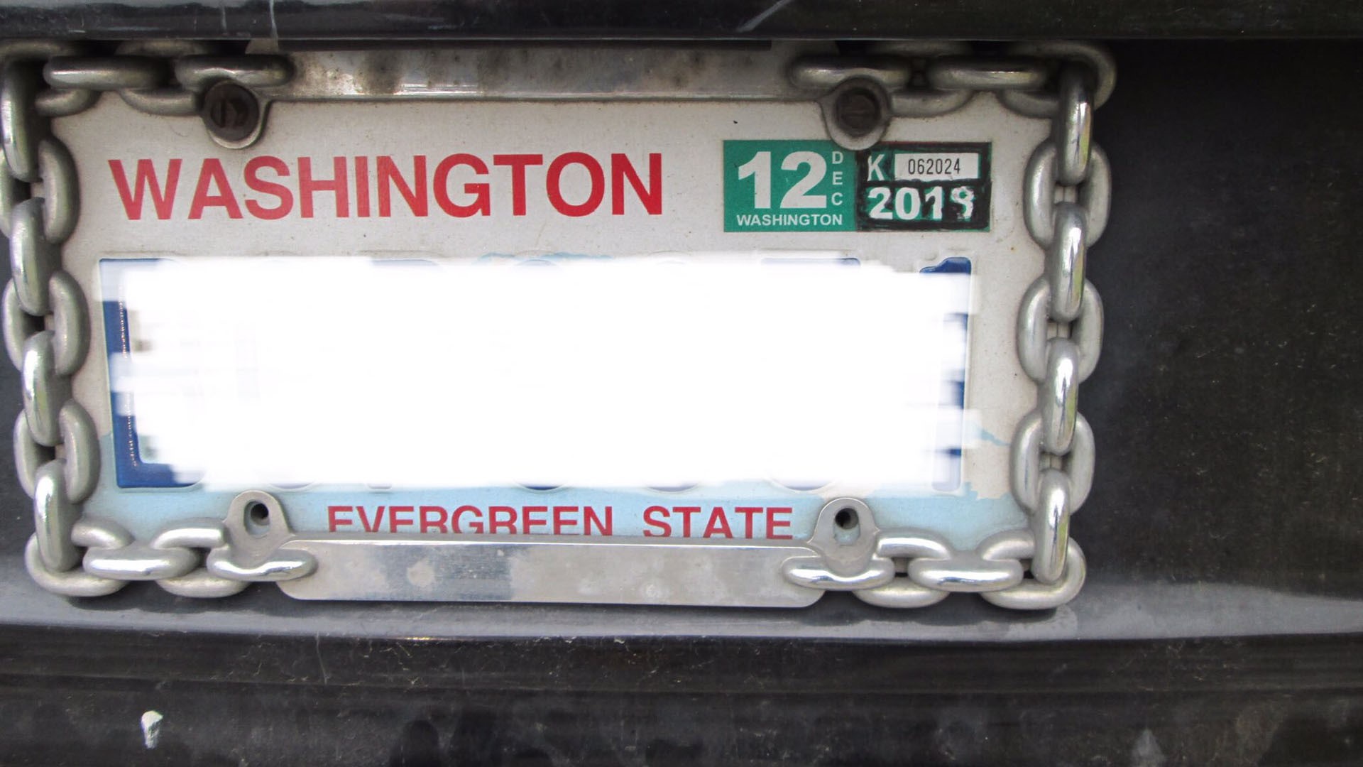 Washington state driver caught with doctored expired license tab ...