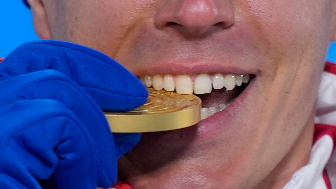 Why do Olympic athletes bite their medals? | king5.com