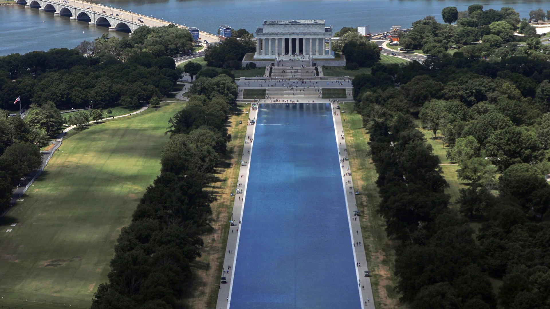 Reflecting Pool liner was cut with a sharp knife or razor, National ...