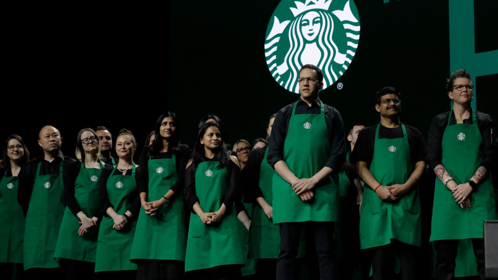Starbucks baristas strike in protest of new dress code | king5.com