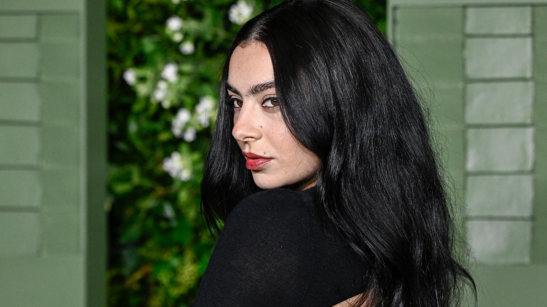 Charli XCX, The 1975 drummer George Daniel marry in London | king5.com