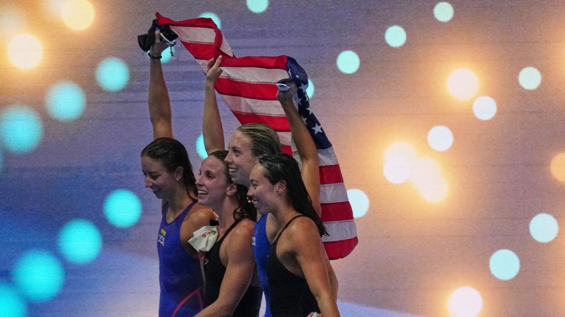 US women set medley relay world record at swim championships | king5.com