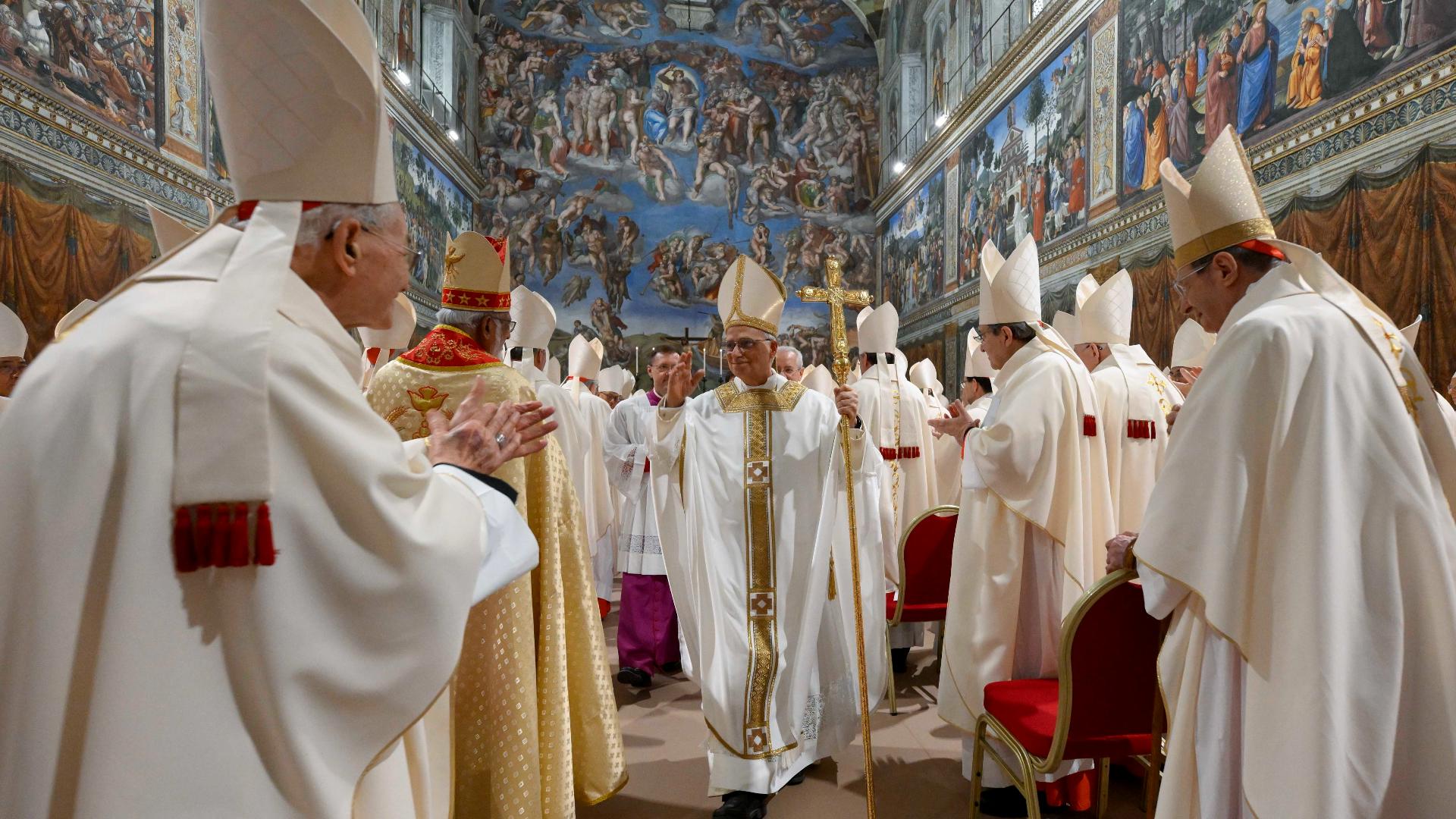 Pope Leo XIV leads historic first Mass at Sistine Chapel | king5.com
