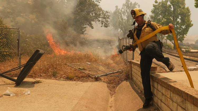 Thousands ordered to evacuate as Southern California wildfire threatens ...