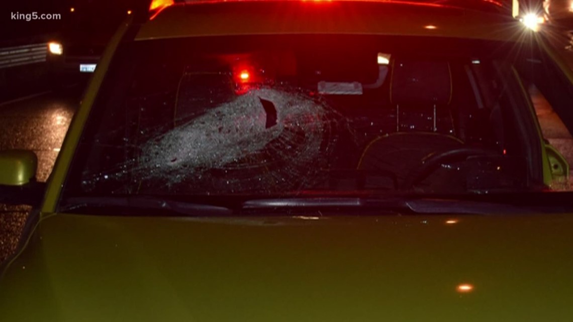 Cars hit by objects thrown from overpass in Seattle | king5.com