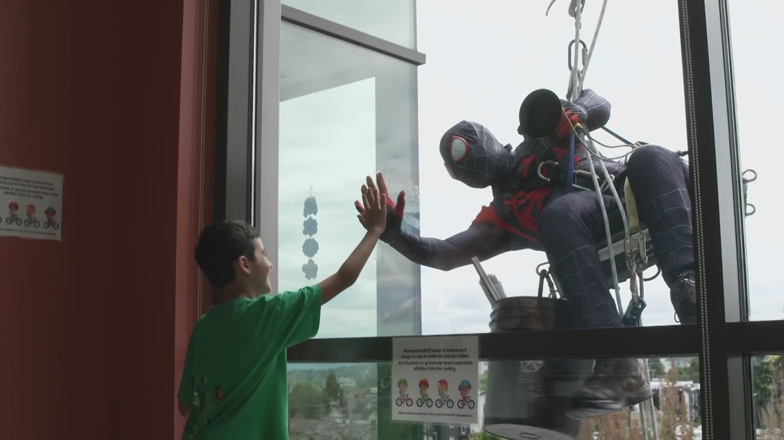 Spiderman window washers visit Mary Bridge Children's Hospital | king5.com