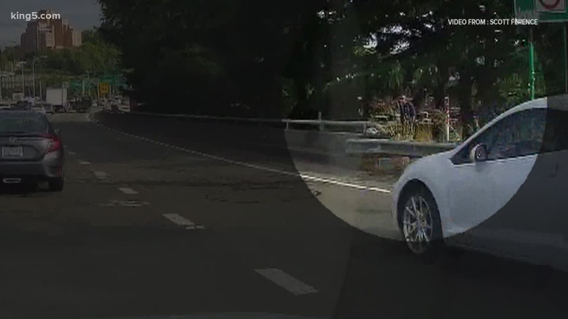Dashcam video appears to show man throwing objects at cars on I-5 in ...