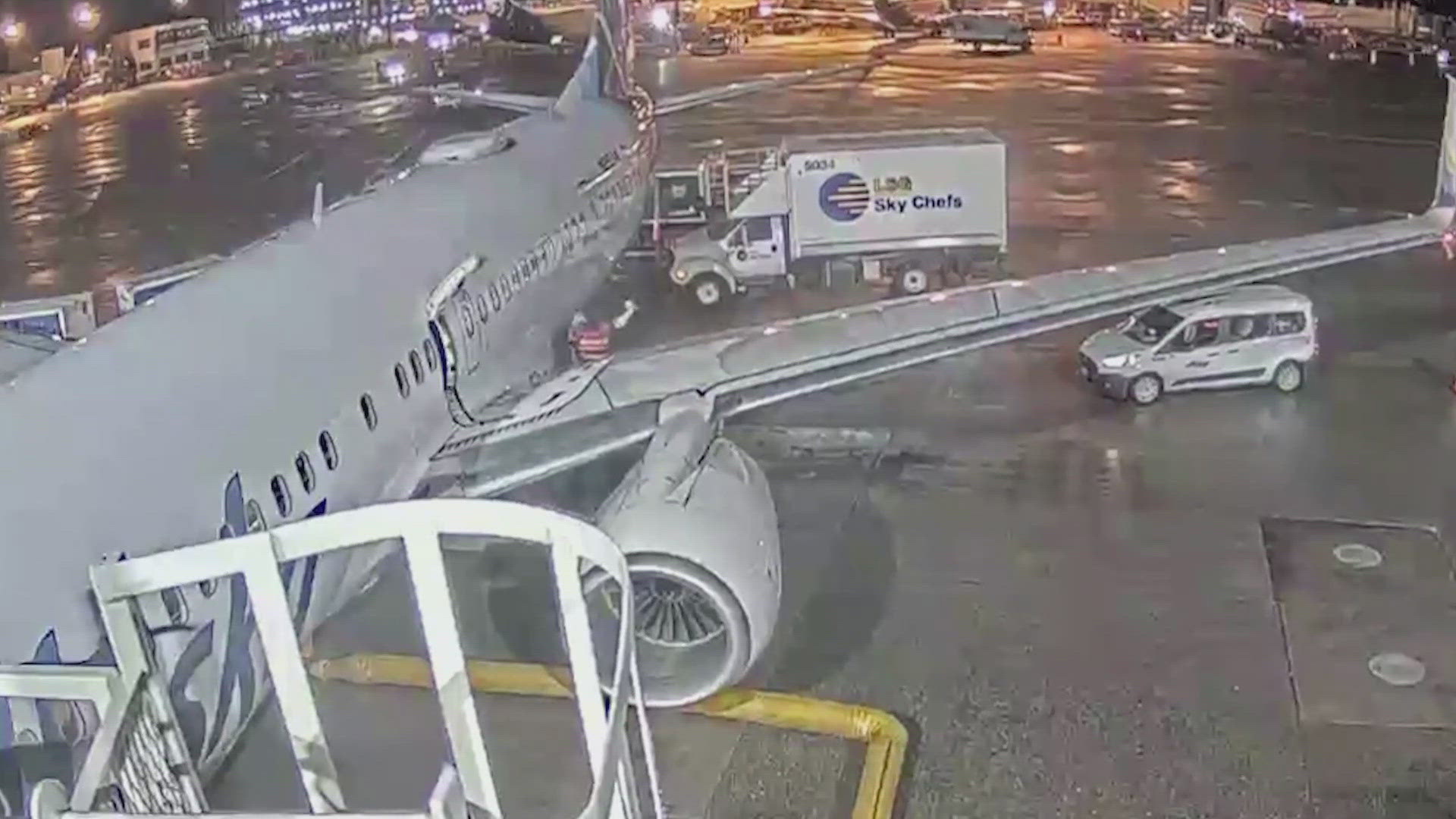 New video shows woman climbing onto wing of plane at SEA Airport ...