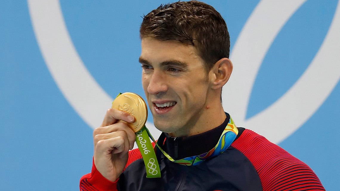 Michael Phelps wins gold in 200 fly, adds to record medal tally | king5.com