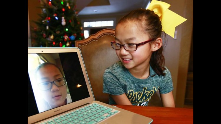 Mom discovers adopted daughter's twin living in Washington | king5.com