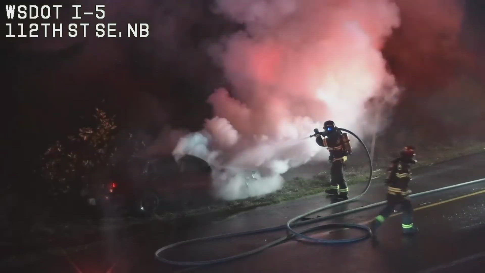 Firefighters battle car fire on I-5 | king5.com