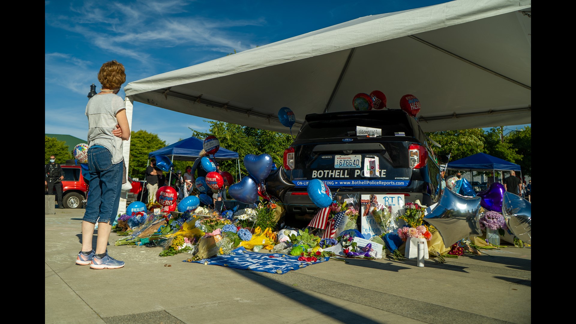 Bothell officers were shot inside their patrol car; suspect held ...