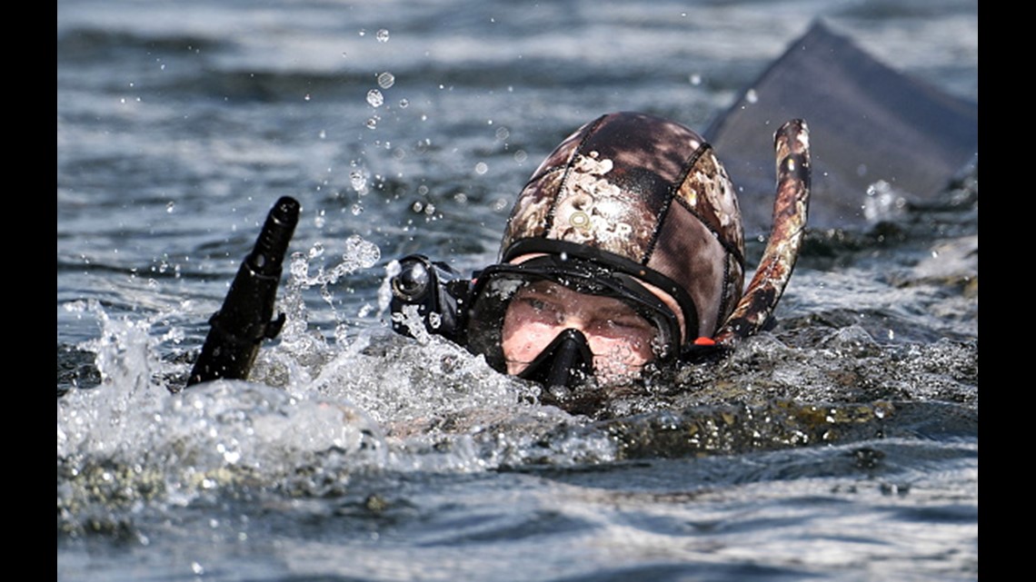 PHOTOS: Russia releases photos of shirtless Putin swimming, fishing on ...