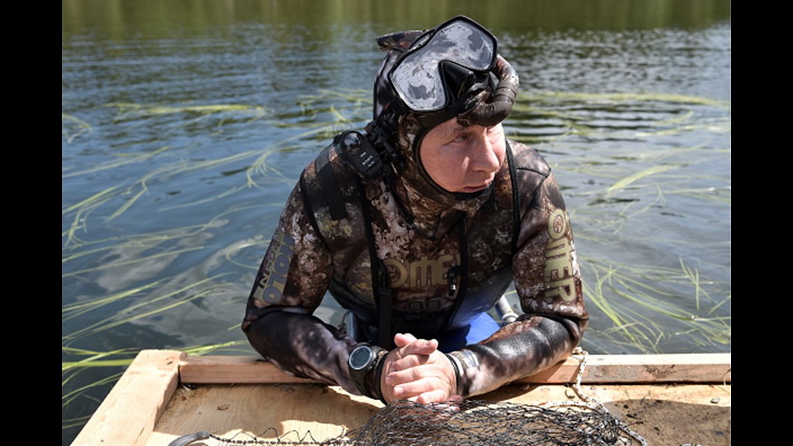 PHOTOS: Russia releases photos of shirtless Putin swimming, fishing on ...