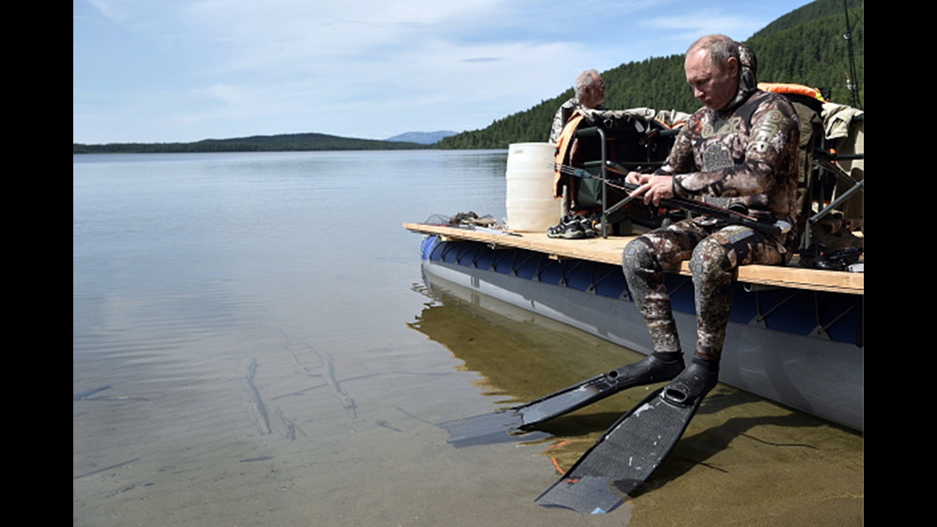 PHOTOS: Russia releases photos of shirtless Putin swimming, fishing on ...