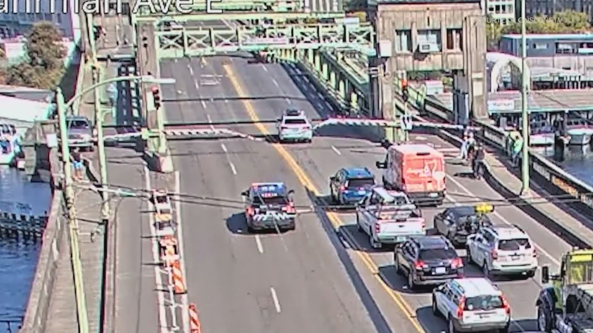 Driver fleeing police jumps partially-open University Bridge | king5.com