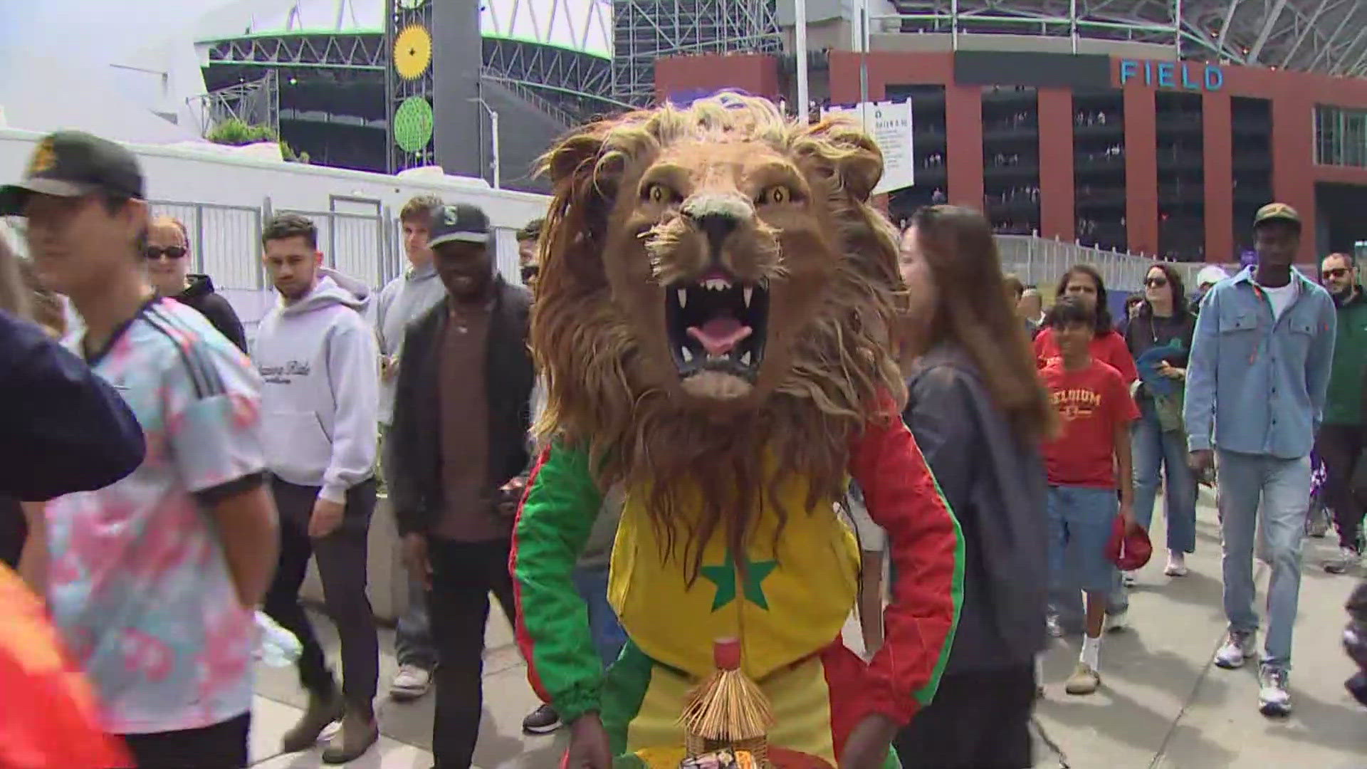 Belgium and Senegal fans march to the match | king5.com