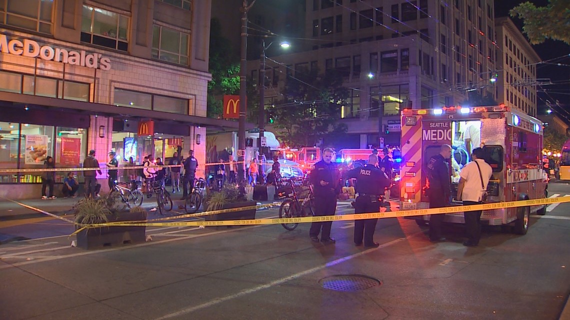 Man attacked with hatchet in downtown Seattle; suspects still at large ...
