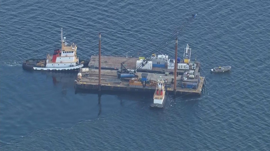 Aerials: Barge arrives to recover floatplane wreckage off Whidbey ...