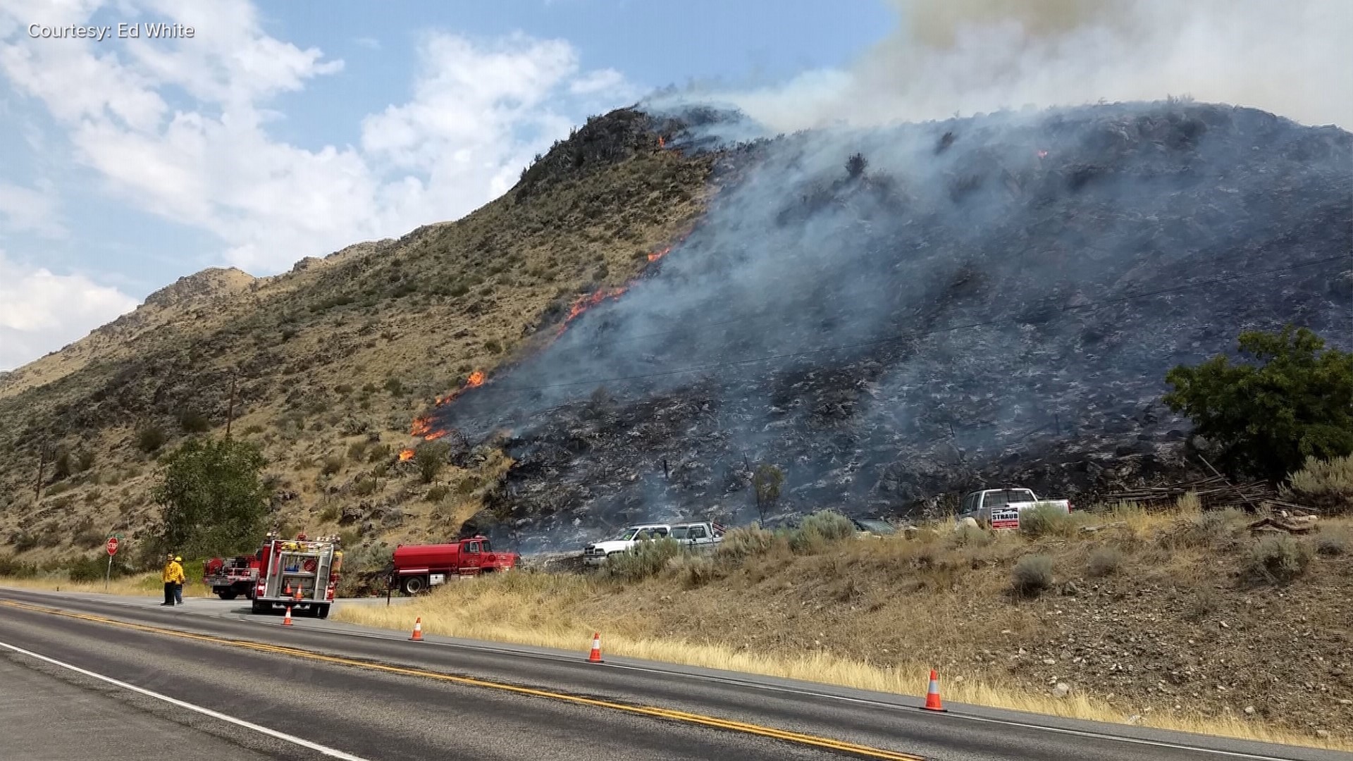 Evacuations remain after rain slows down Chelan wildfire | king5.com