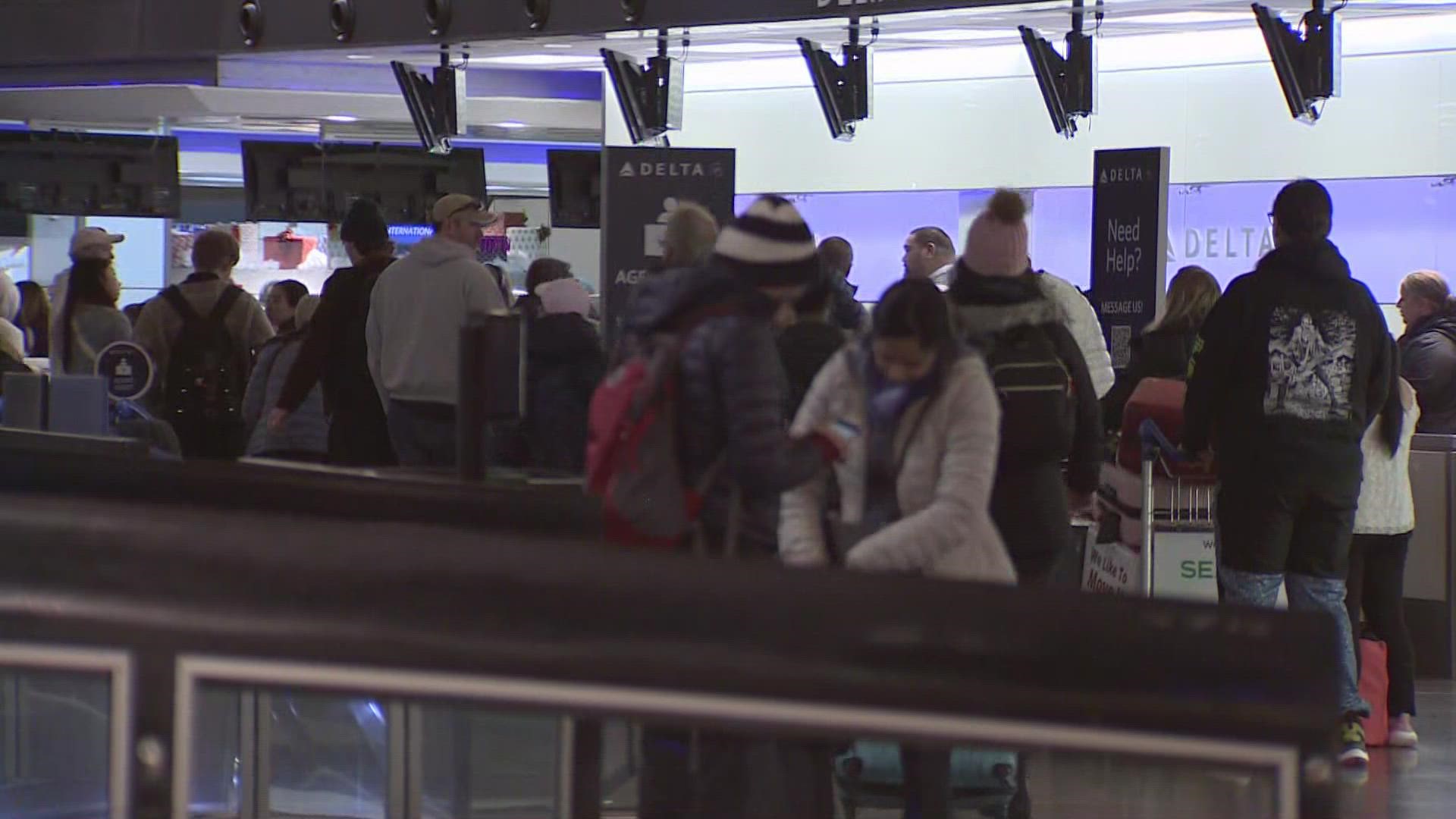 Nearly 200 flights canceled at Sea-Tac Airport as snow falls across ...