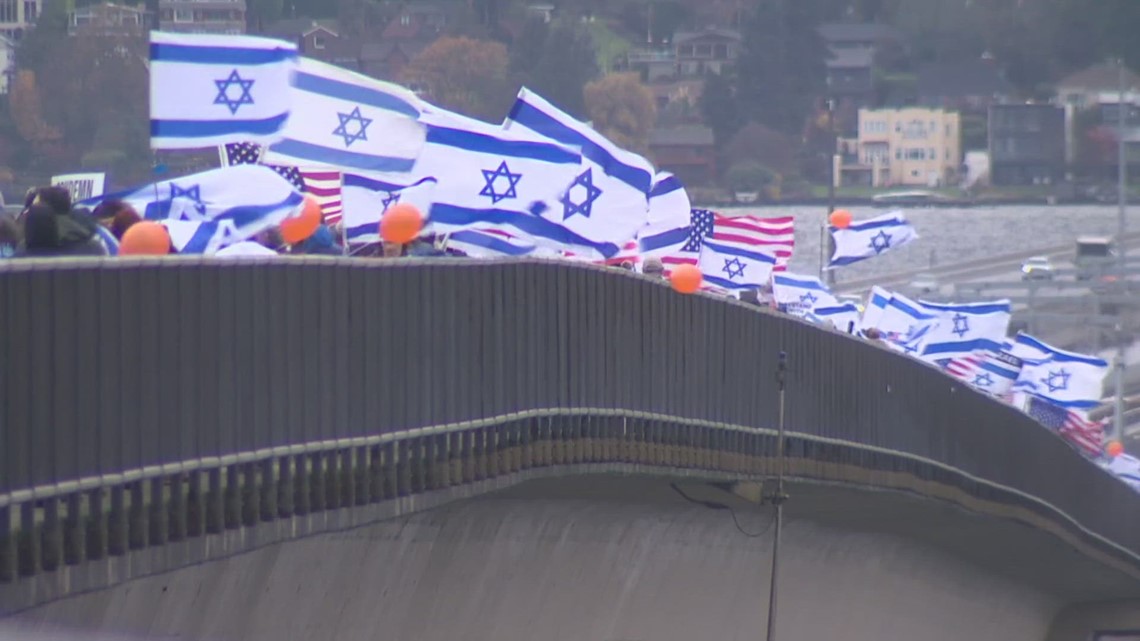 Hundreds march along I-90 in Mercer Island in support of Israel | king5.com