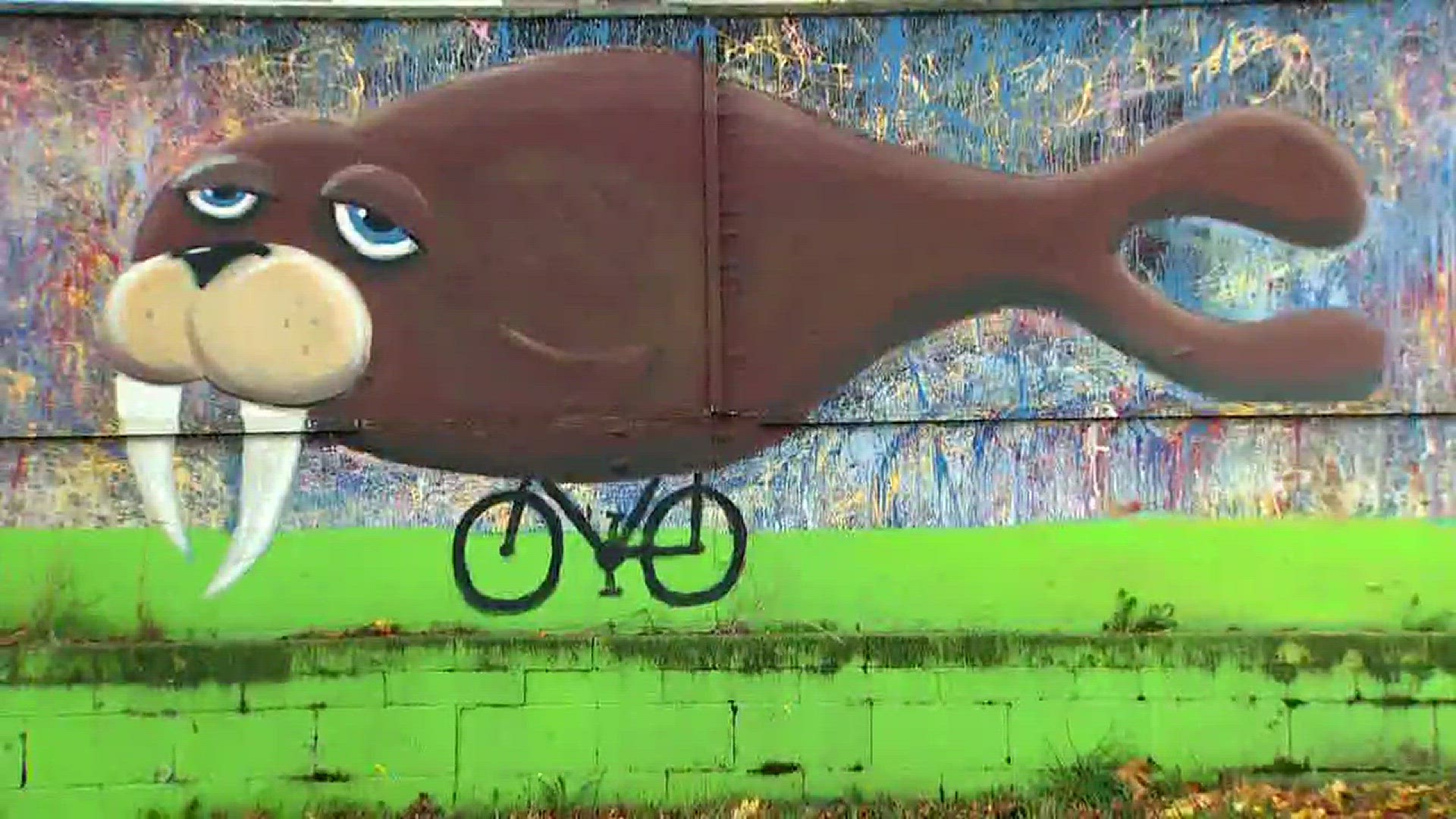 Who's the artist behind Seattle's 'Henry' murals? | king5.com