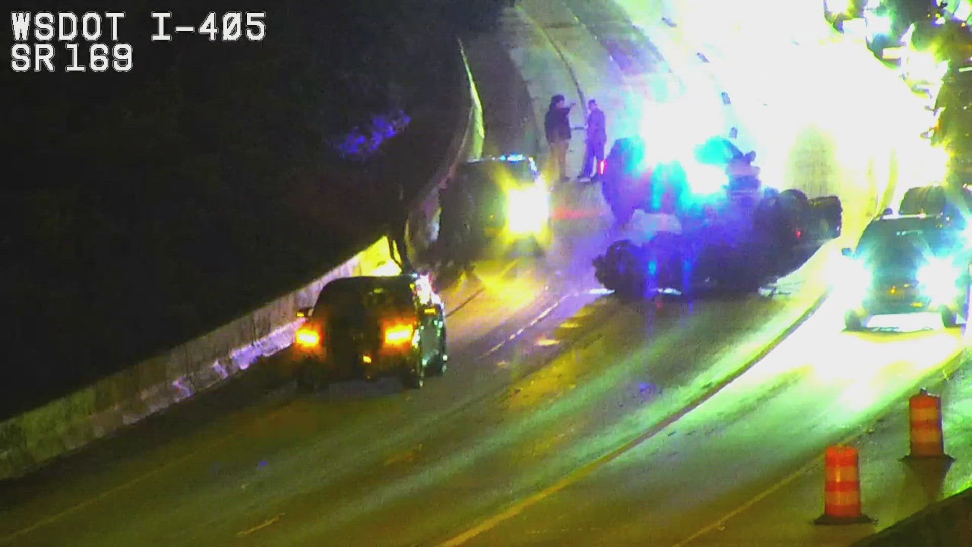 Flipped car blocks multiple lanes of I-405 | king5.com
