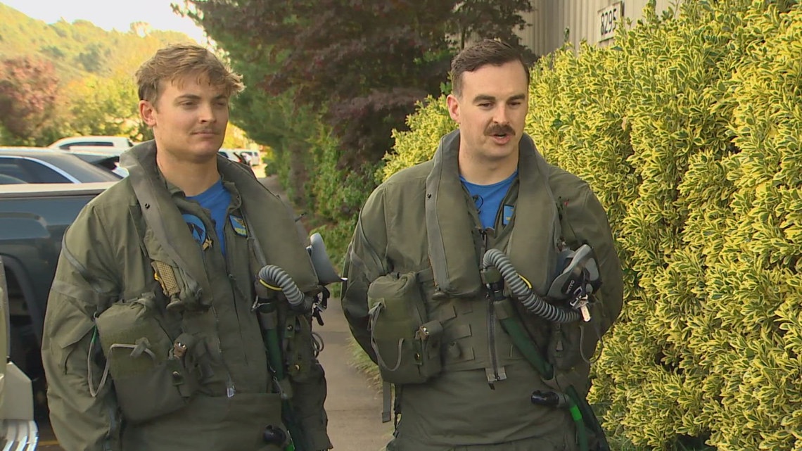 Two Navy pilots doing flyover for Washington-Michigan game in Seattle ...