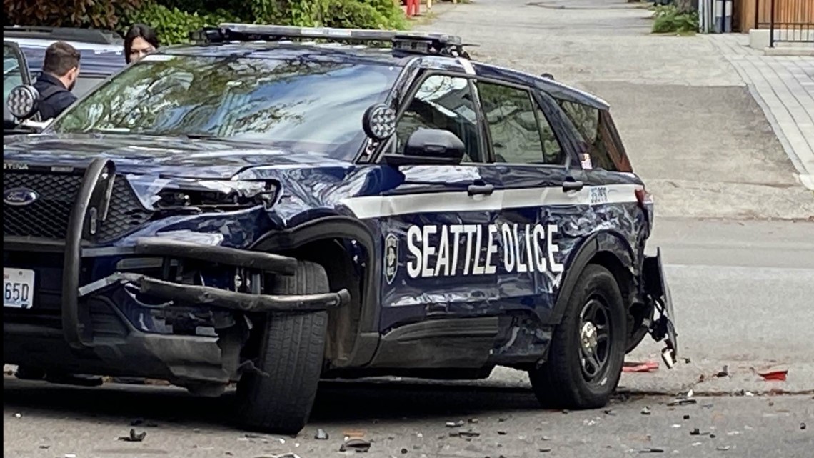 Seattle police cars damaged by driver trying to escape arrest | king5.com