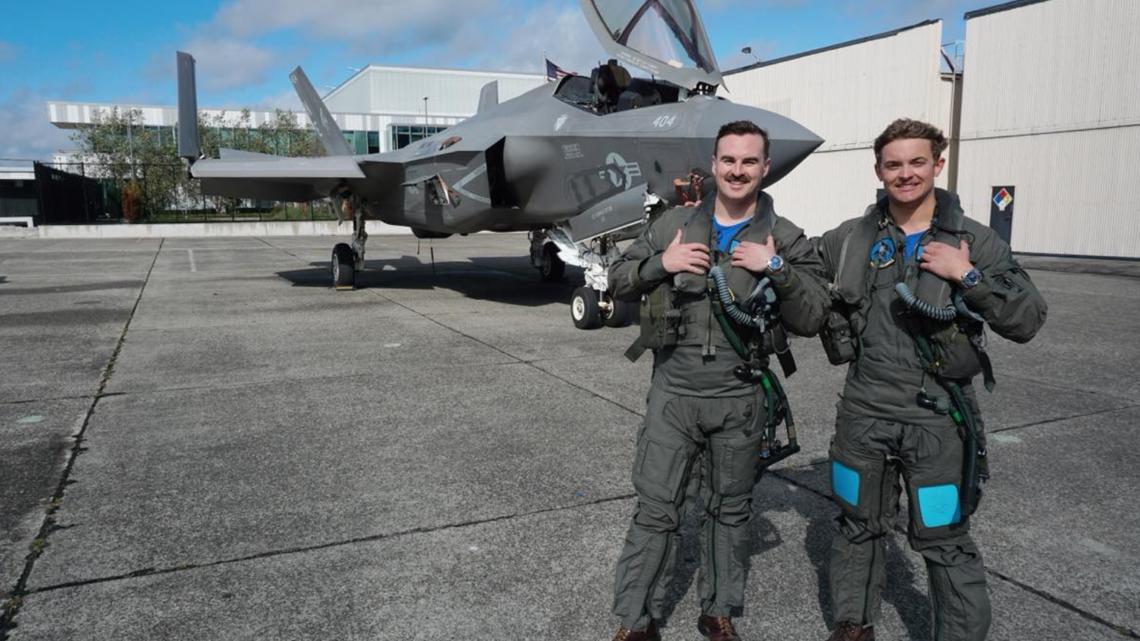 Two Navy pilots doing flyover for Washington-Michigan game in Seattle ...