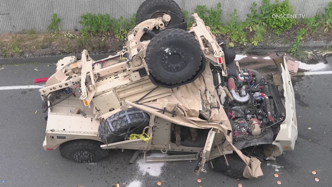 2 hurt after military Humvee falls on to I-90 | king5.com