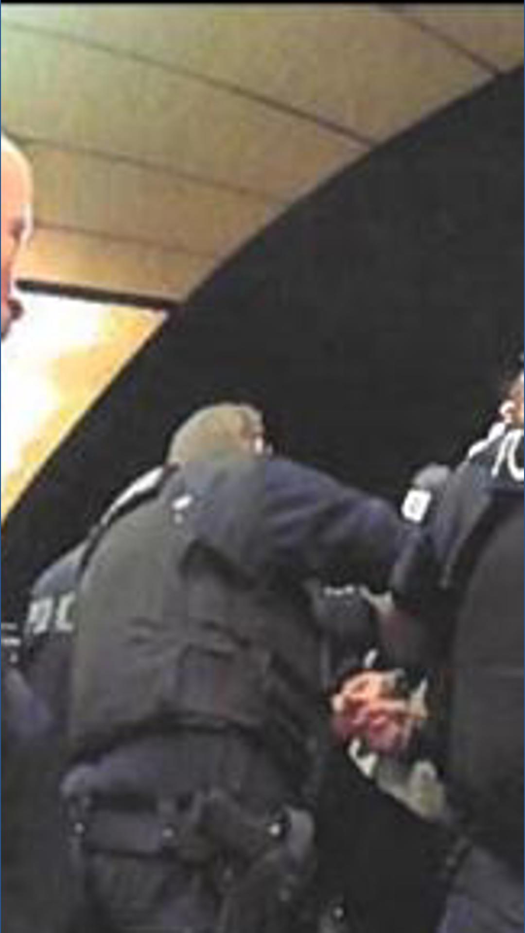 Intoxicated traveler accused of spitting on officer during arrest at ...