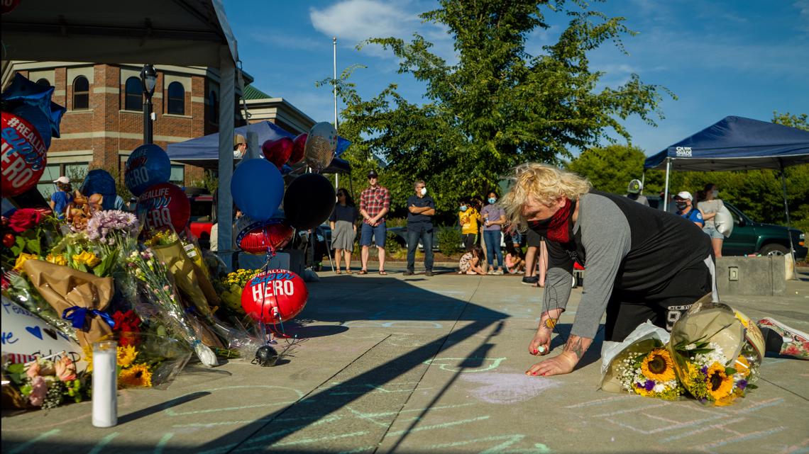 Bothell officers were shot inside their patrol car; suspect held ...