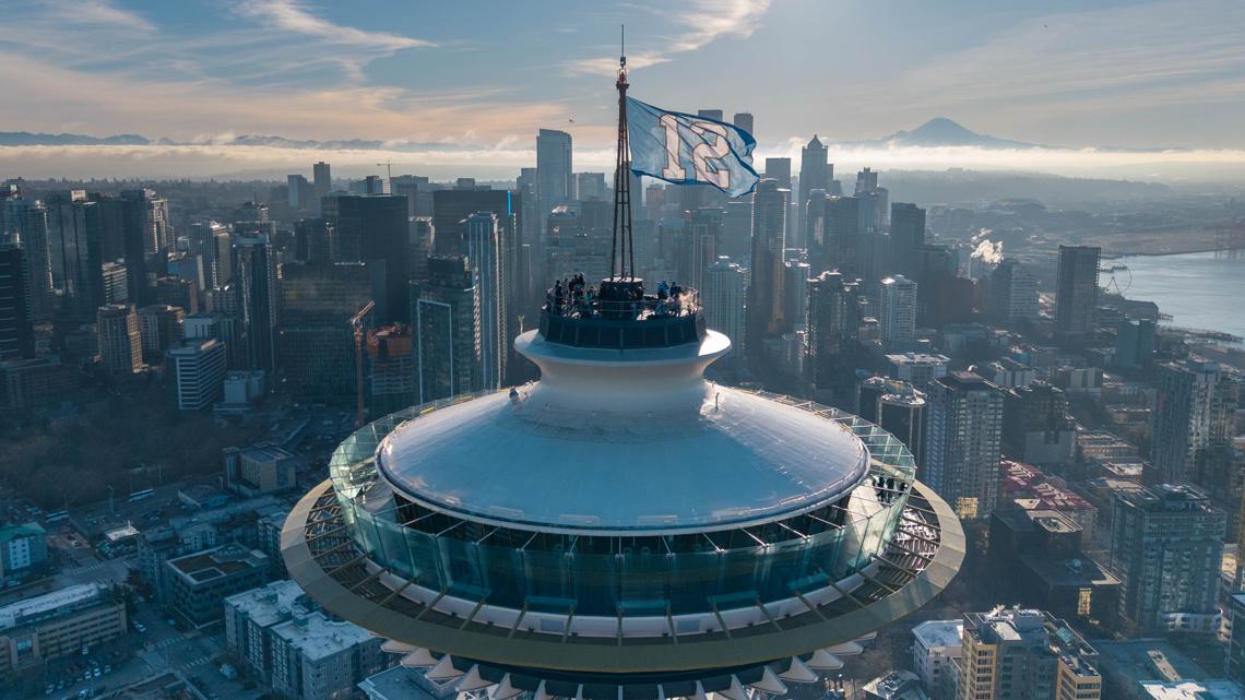 12th Man flag flies above Seattle ahead of Seahawks game | king5.com