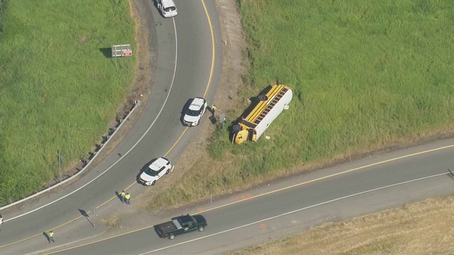 School bus with adults and students on board rolls in Burlington, minor ...