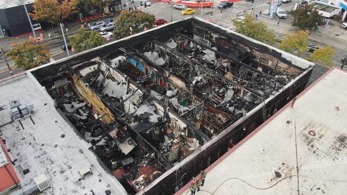 Business owners survey damage from Ballard fire linked to overheated ...