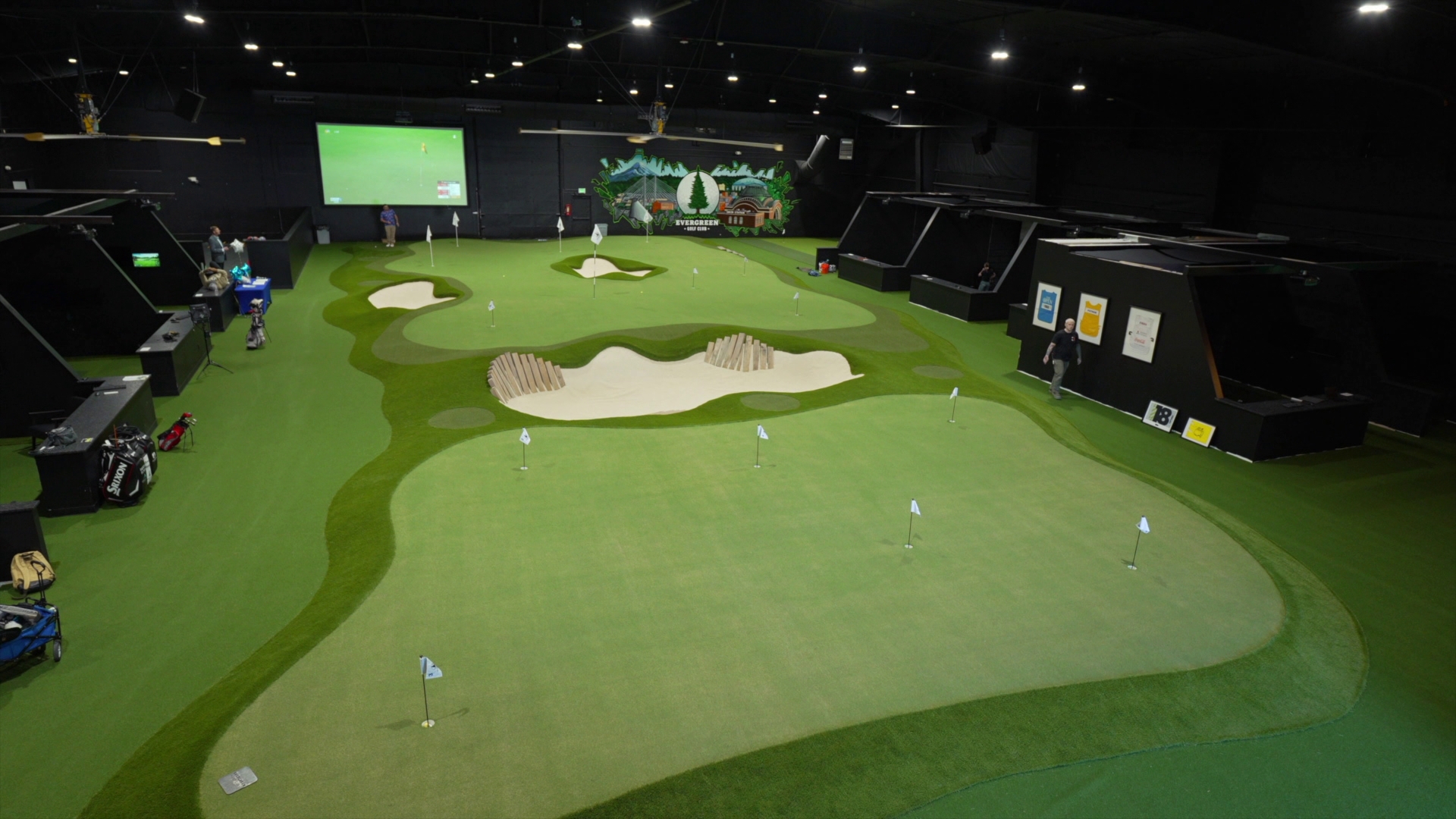 Tee off in any weather at Tacoma's new indoor golf facility | king5.com