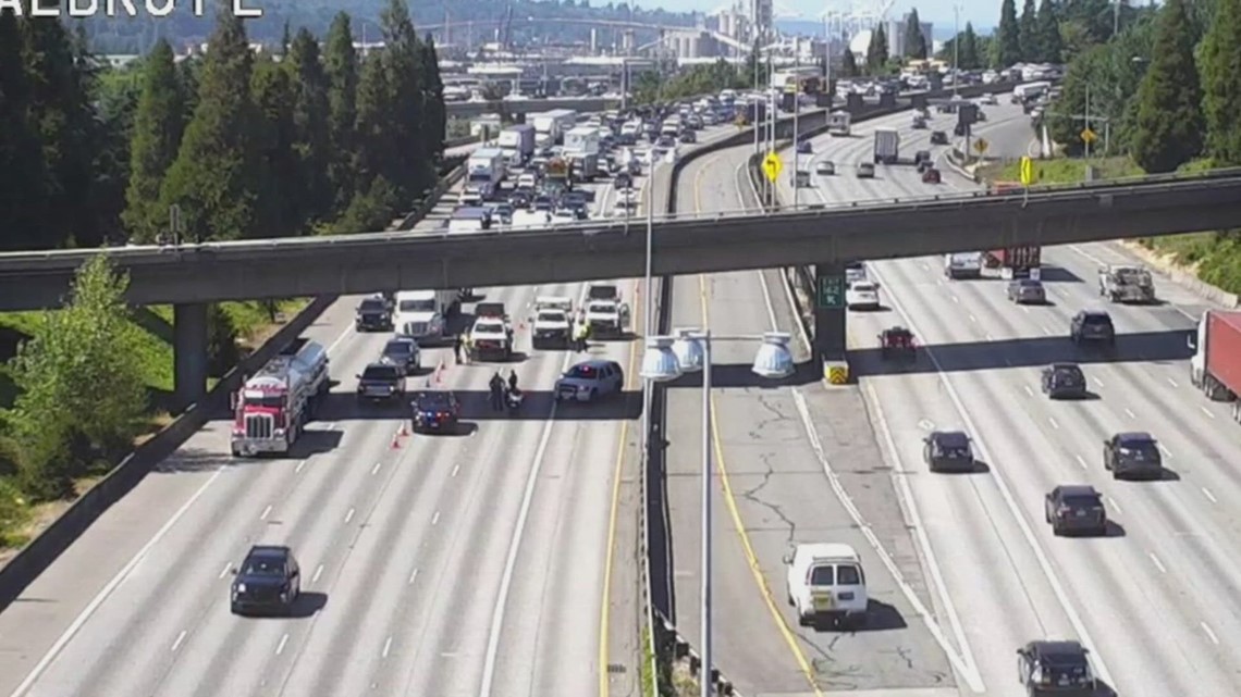 Bellevue officer in critical condition after falling off on-ramp onto I-5 in Seattle | king5.com