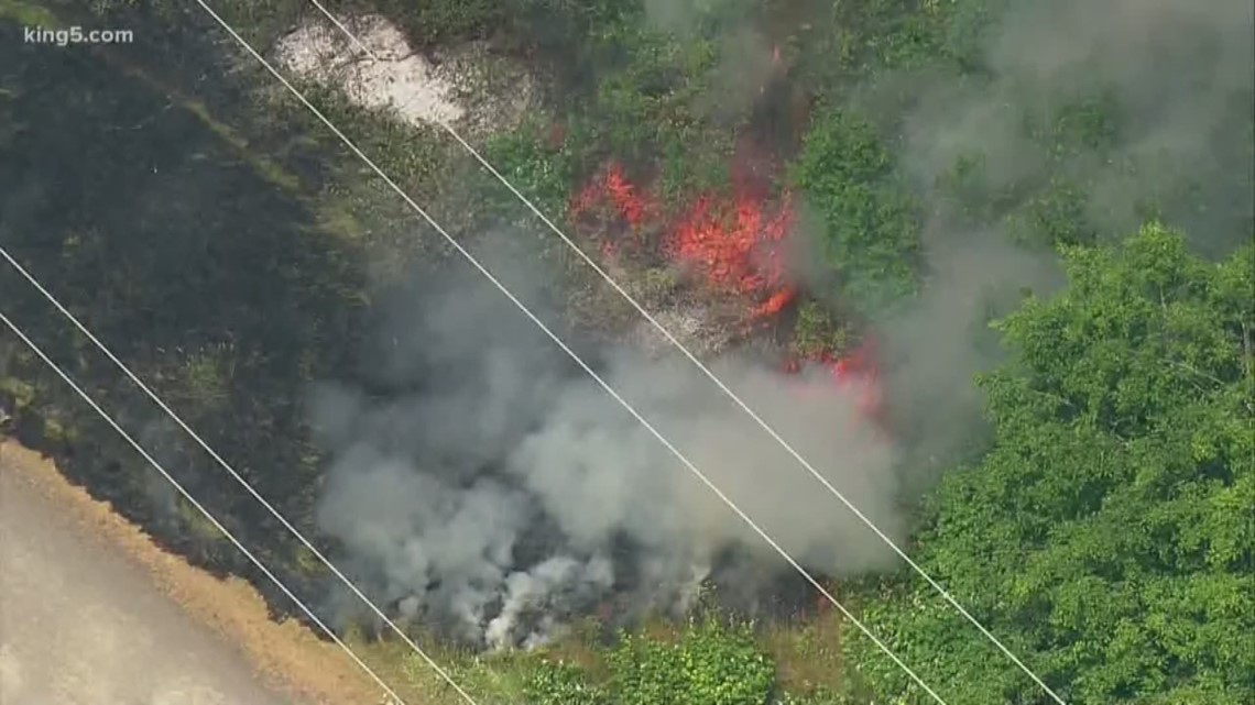 Redmond brush fire dangerously close to neighborhood | king5.com