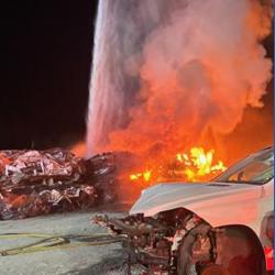 Explosions reported as fire burns stacks of vehicles at Graham wrecking ...
