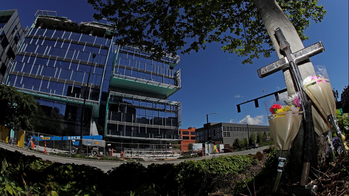 Tech and construction workers pause at scene of Seattle crane collapse ...