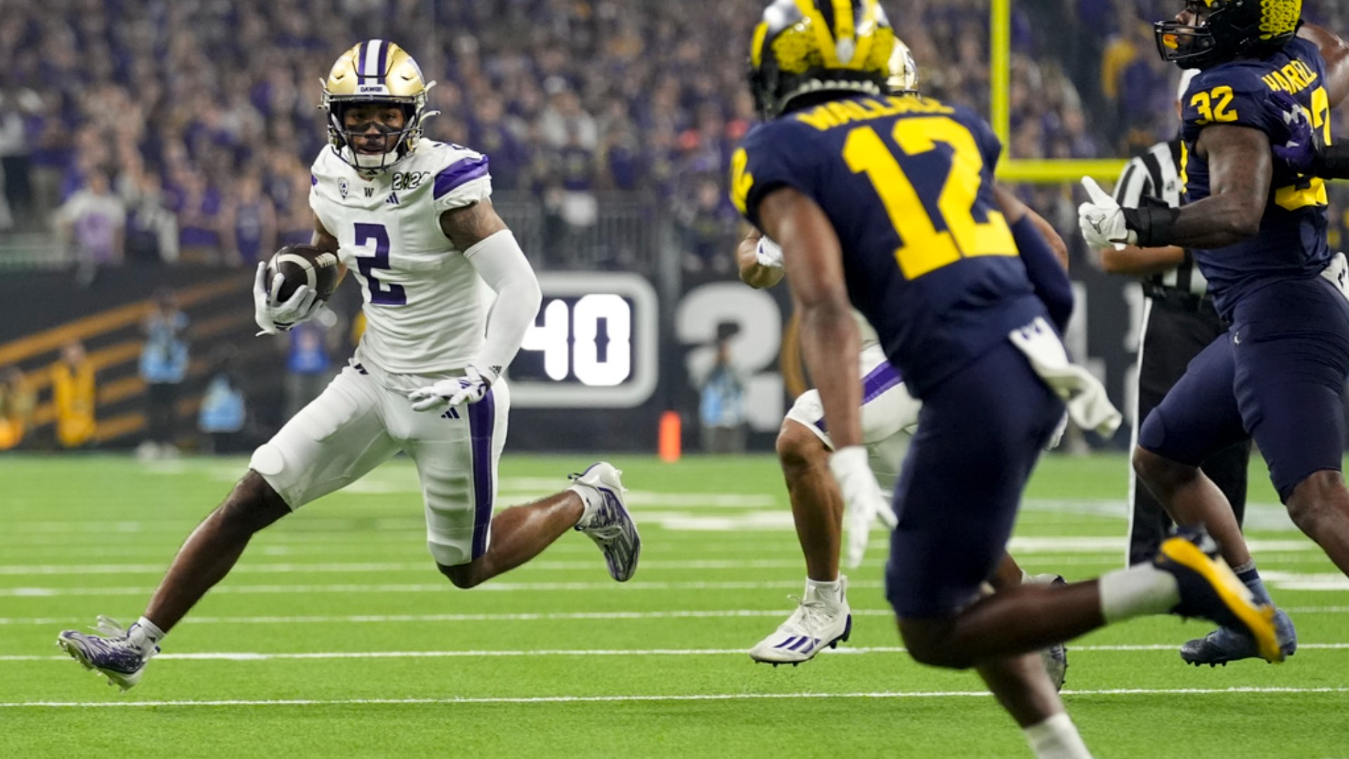 Washington loses 34-13 to Michigan in National Championship Game ...