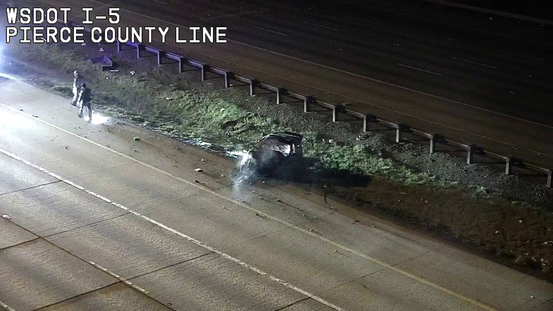 Driver ejected in rollover crash on I-5 threatens bystander with gun ...