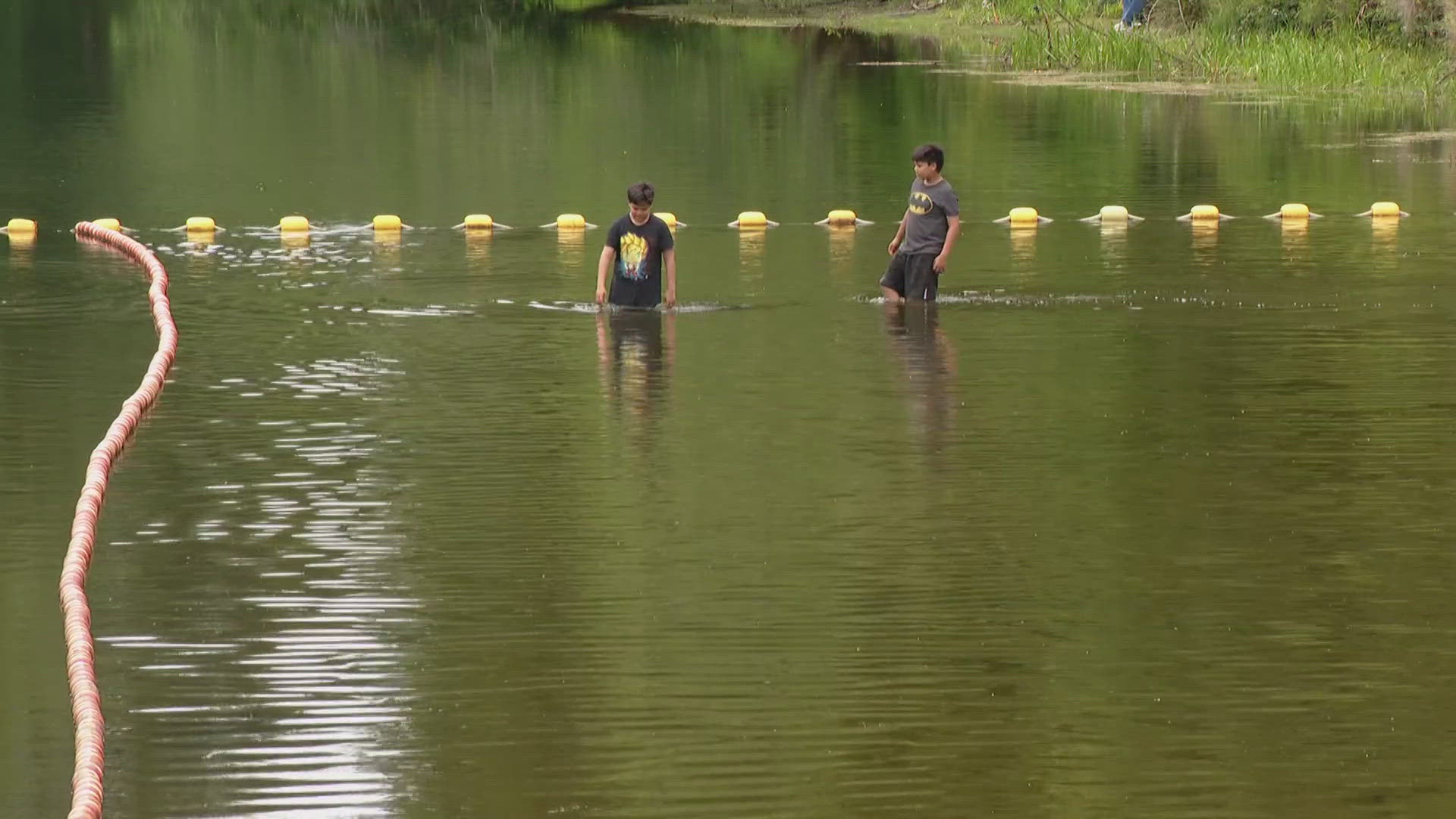 Cracks in century-old dam prompt drawdown at Sylvia Lake | king5.com