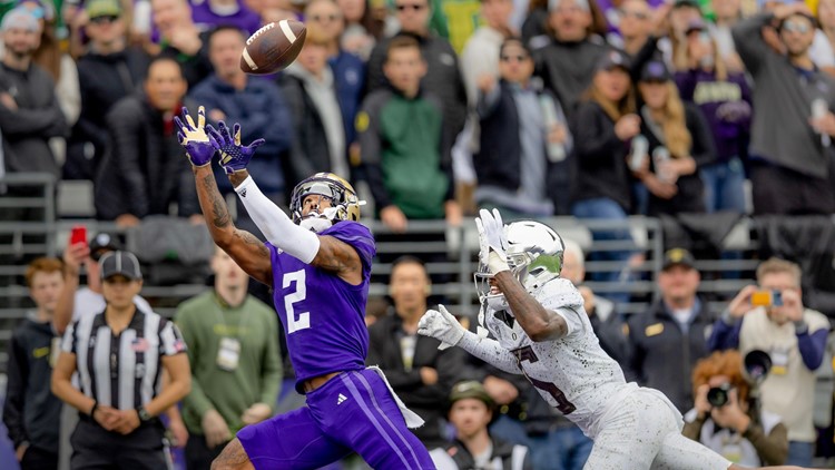 The photographer tasked with capturing Husky history | king5.com