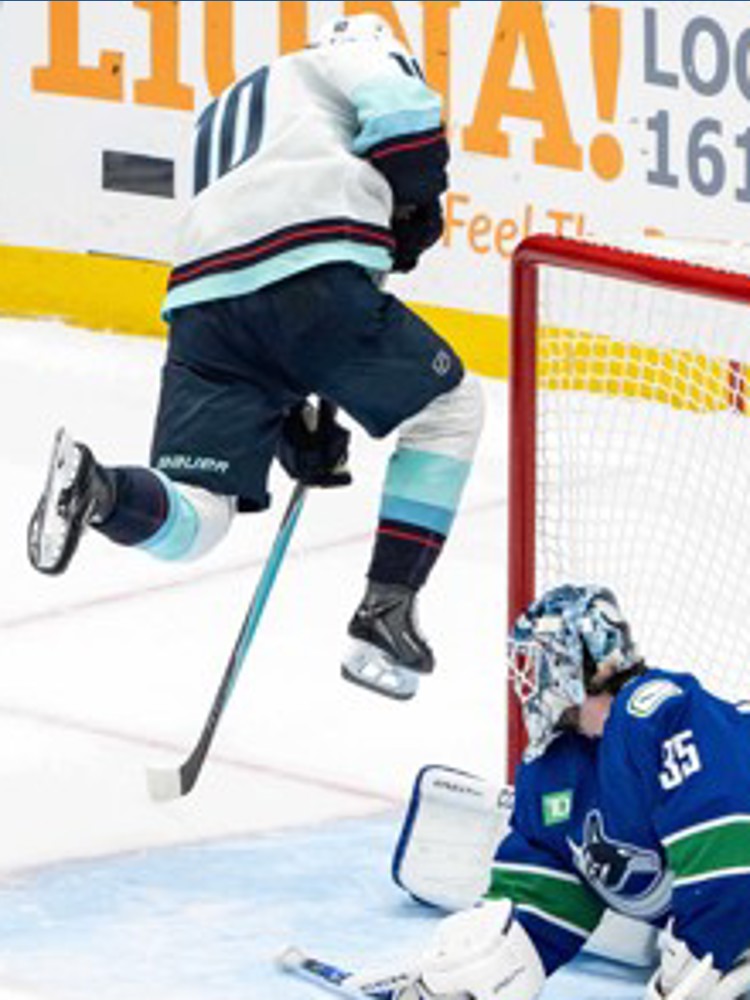 Matty Beniers scores in shootout to give Kraken 4-3 win over Canucks ...