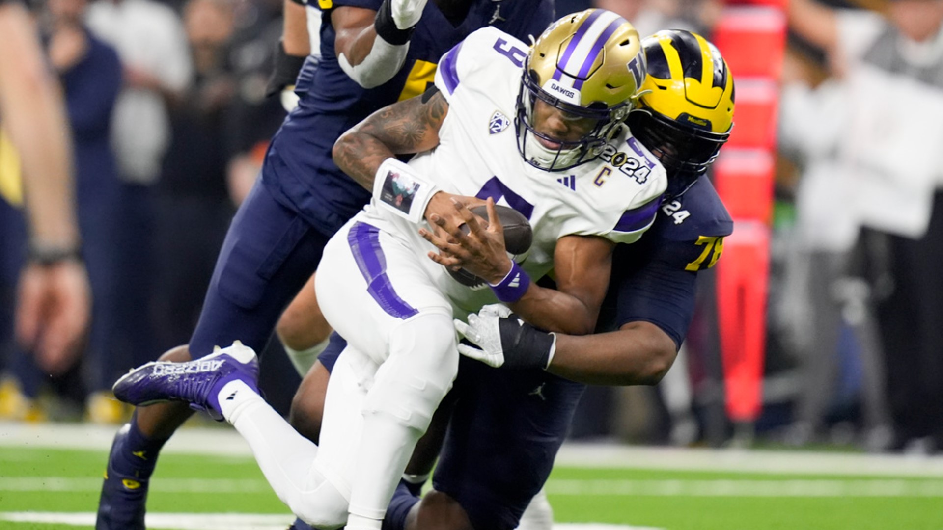 Washington loses 34-13 to Michigan in National Championship Game ...